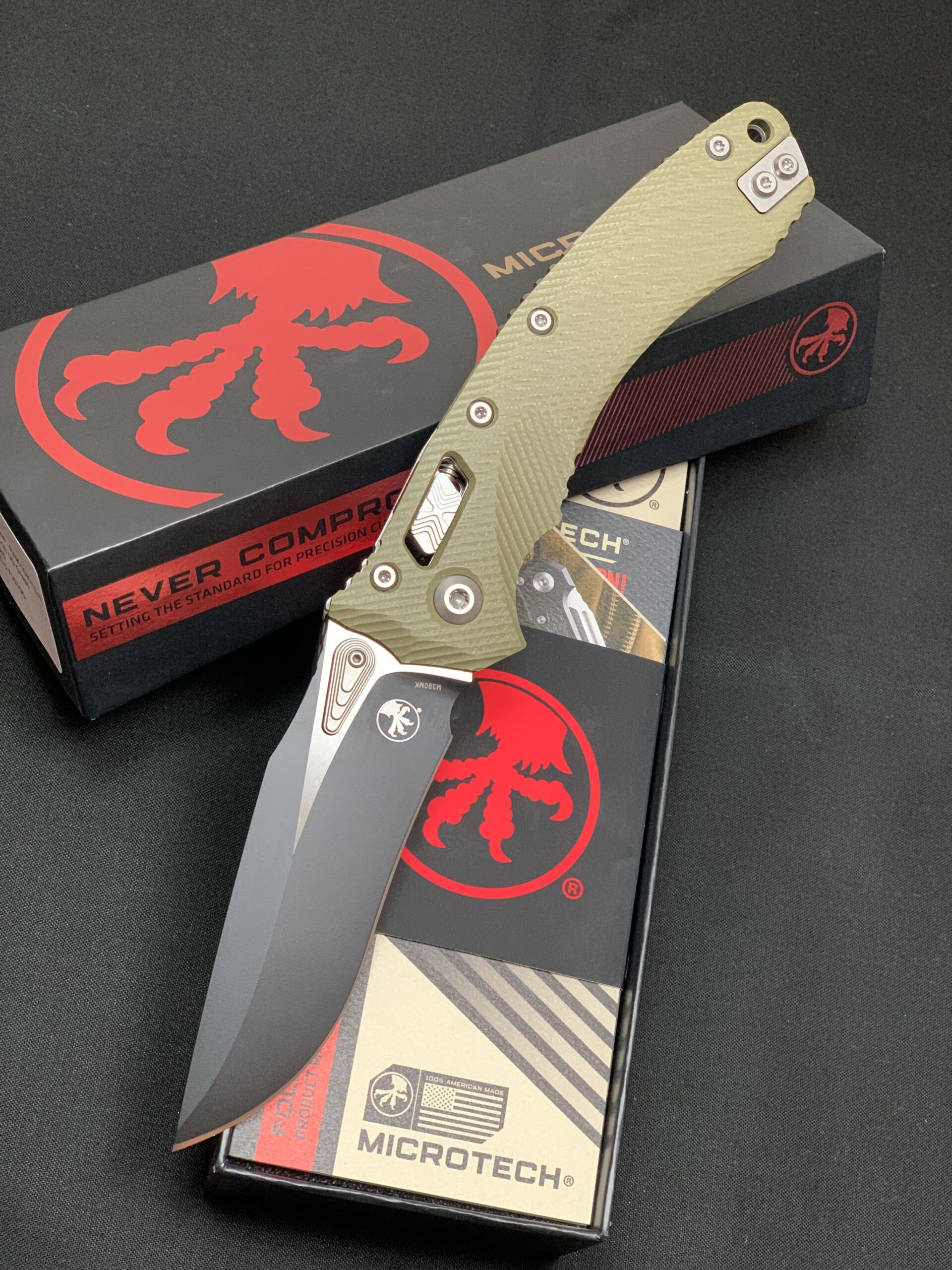 Microtech Amphibian RAM LOK S E Black Blade Fluted OD Green G10 Microtech Amphibian RAM LOK S E Black Blade Fluted OD Green G10